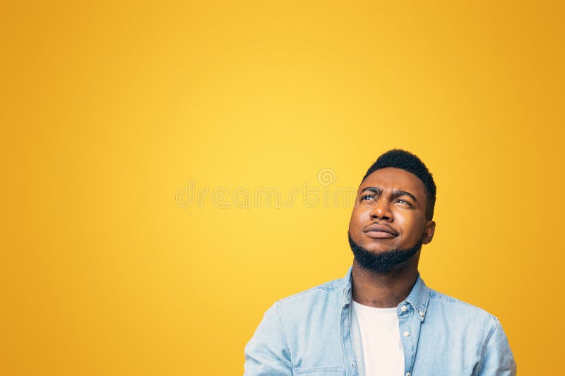 Portrait of Suspicious Black Guy Looking Upwards at Copy Space Stock ...
