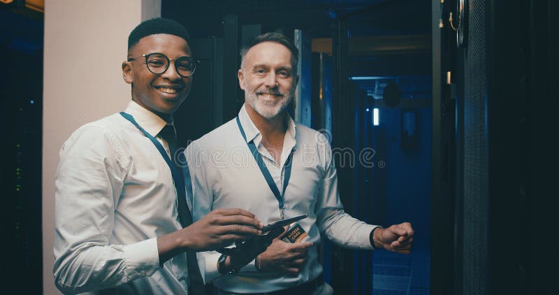 Portrait, Tablet and Men in Server Room, Hardware Upgrade and Teamwork ...