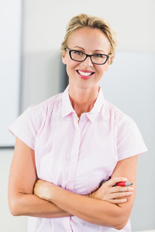 Portrait of Teacher Smiling in Classroom Stock Photo - Image of ...