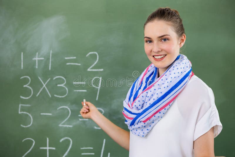 Portrait of Teacher Teaching Mathematics in Classroom Stock Image ...