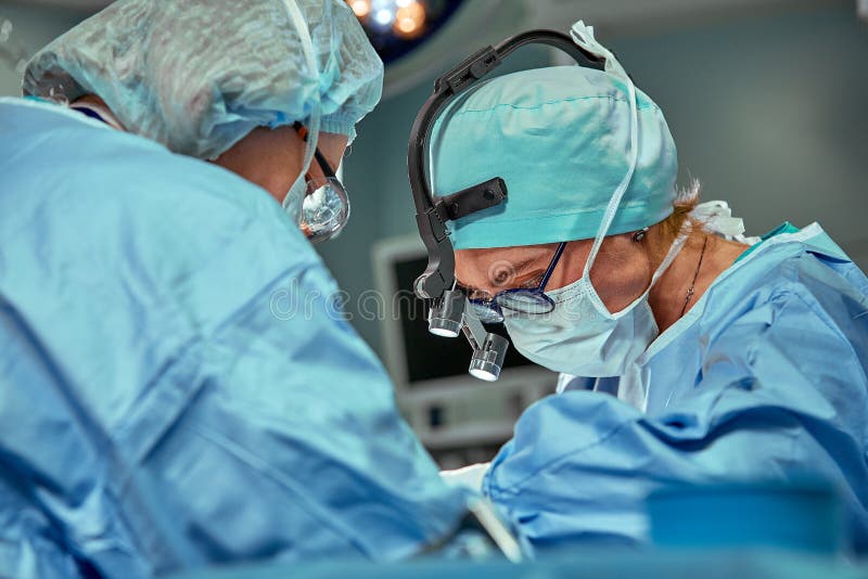 Portrait of a Team of Surgeons at Work. during Surgery. Concept ...