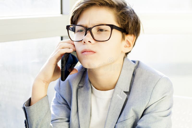 Teen Boy Using Mobile Phone Stock Image - Image of happy, young: 101484589