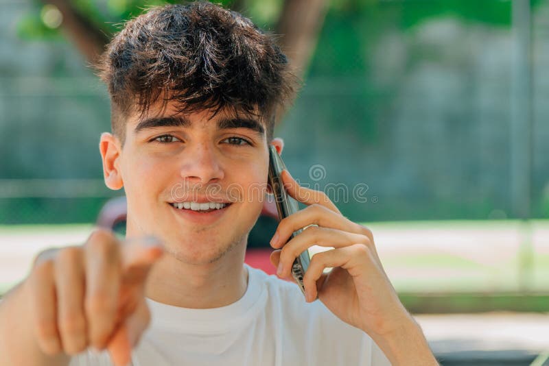 Teenage Boy Talking on Mobile Phone Stock Photo - Image of school ... Teenage Boy Talking on Mobile Phone Stock Photo - Image of school ...
