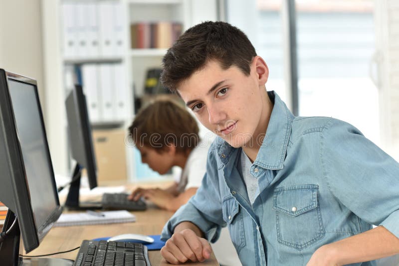 Portrait of Teenager Working on Computer Stock Photo - Image of years ...