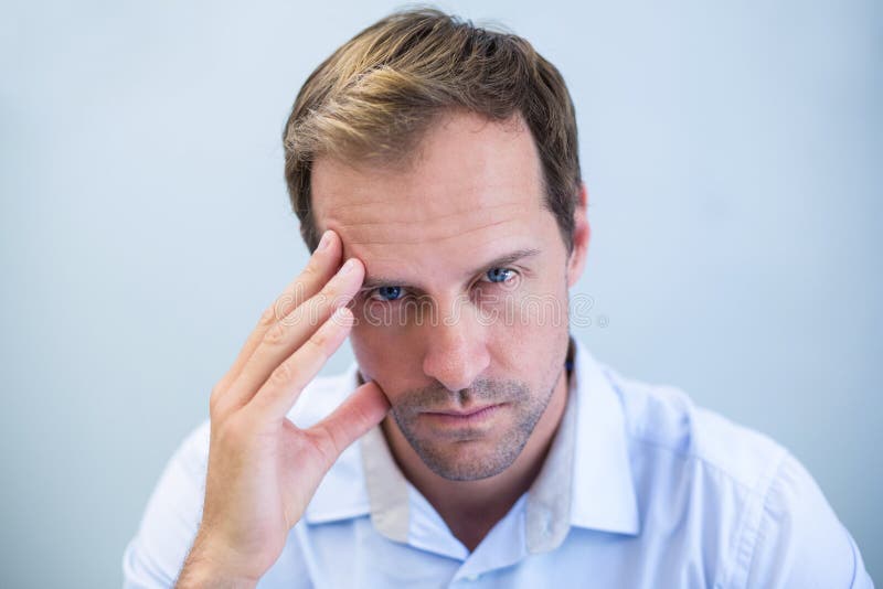 Portrait of Tensed Doctor with Hand on Forehead Stock Image - Image of ...