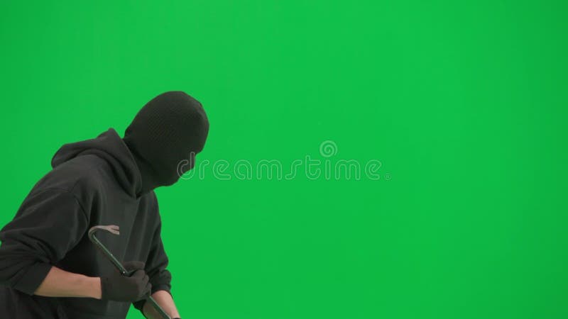 Portrait Of Thief On Chroma Key Green Screen Background Man Robber In
