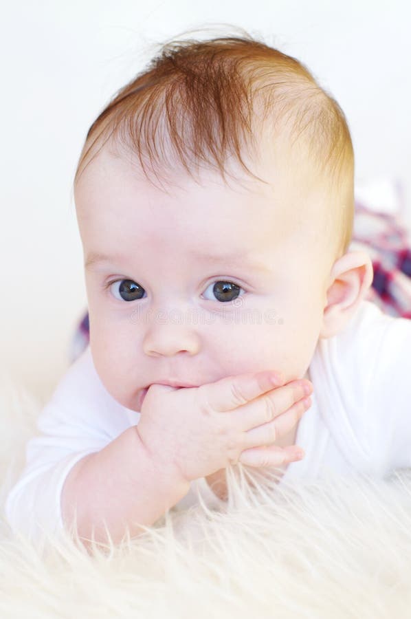 Portrait of the Thoughtful Baby Sucking Finger Stock Photo - Image of ...