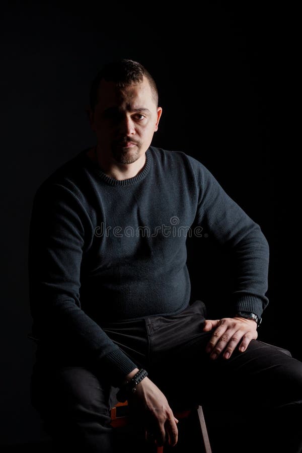 Portrait of a Thoughtful Man in Shadowed Lighting Stock Image - Image ...