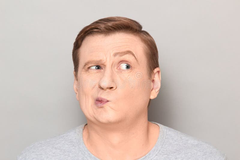 Portrait of Thoughtful Mature Man with Focused Expression on Face Stock ...