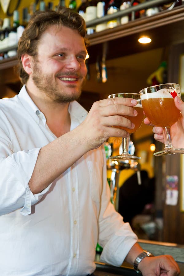 Portrait of Thoughtful Men Drinking Beer at the Pub Stock Photo - Image ...