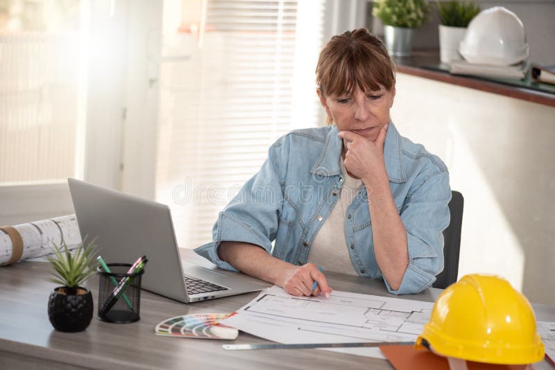 Portrait of Thoughtful Middle Aged Female Architect Stock Photo - Image ...
