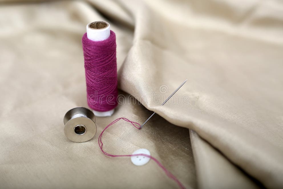 Portrait of Thread and Needle Attached in Cloth with Sewing Thread and ...