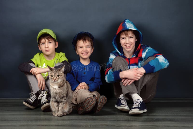 Three Brothers are Play on Beach Stock Photo - Image of childhood ...