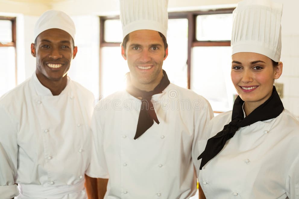 Portrait of Three Chefs in Commercial Kitchen Stock Image - Image of ...