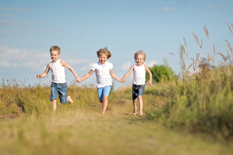 Portrait of Three Children Playing Stock Image - Image of children ...