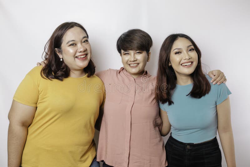 A Portrait of Three Friends are Smiling Expressing Happy Feeling ...