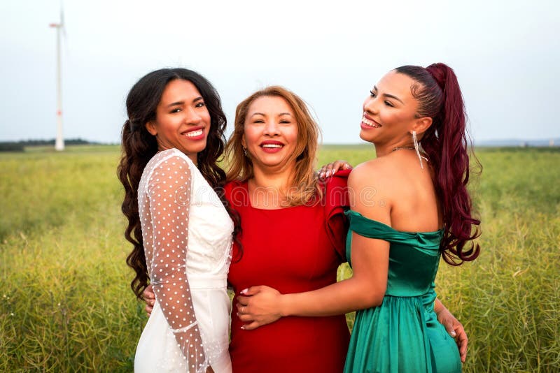 Portrait of Three Hispanic Women Hugging Outdoors Stock Image - Image ...