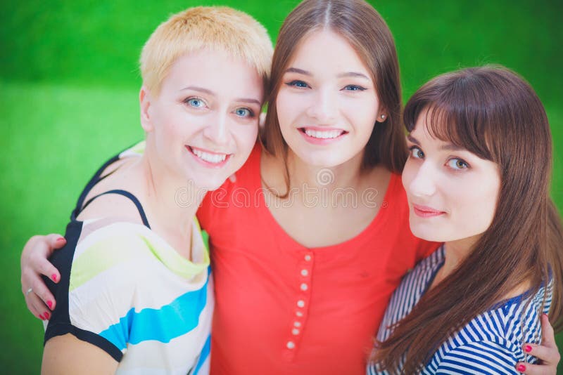Portrait of Three Young Women, Standing Together Stock Image - Image of ...