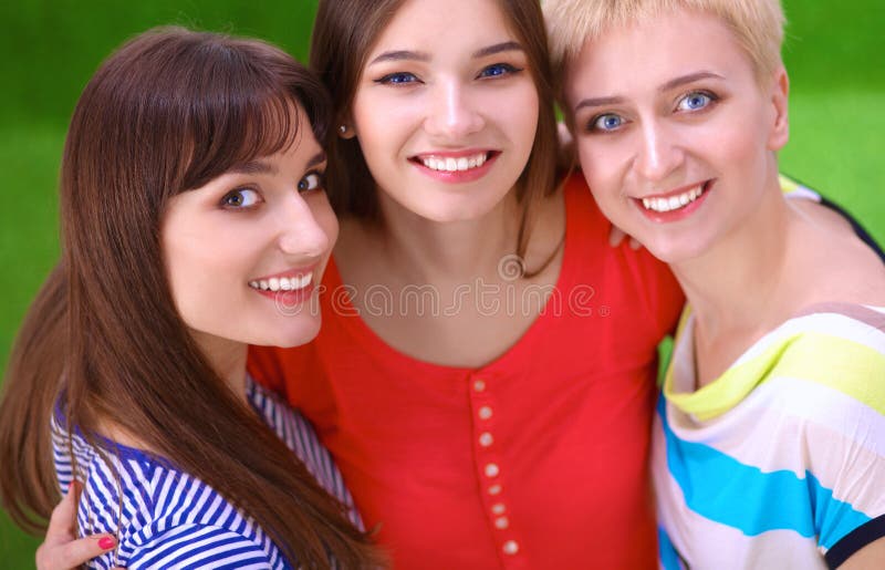 Portrait of Three Young Women, Standing Together Stock Photo - Image of ...