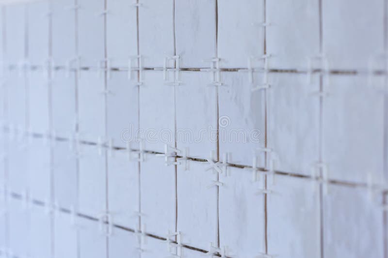 A Portrait of a Tile Wall Under Construction. the Wall is Being Tiled ...