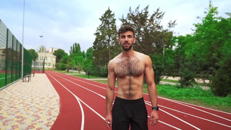 Portrait of Shirtless Muscular Young Black Man Taking a Breather at the ...