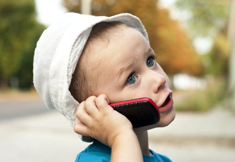 A Portrait of a Toddler with Cellular Phone Stock Photo - Image of ...