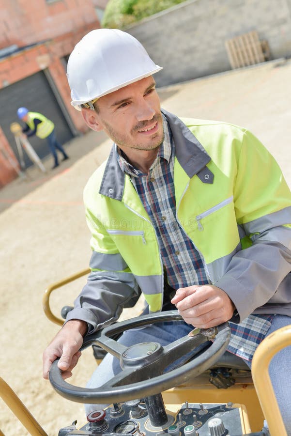 Portrait Tractor Operator at Construction Site Stock Photo - Image of ...