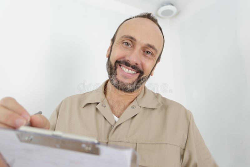 Portrait Tradesman Holding Clipboard Stock Image - Image of reliable ...