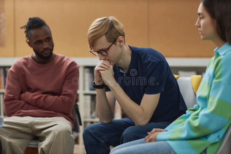 Troubled Young Man in Support Group Circle Stock Image - Image of boys ...