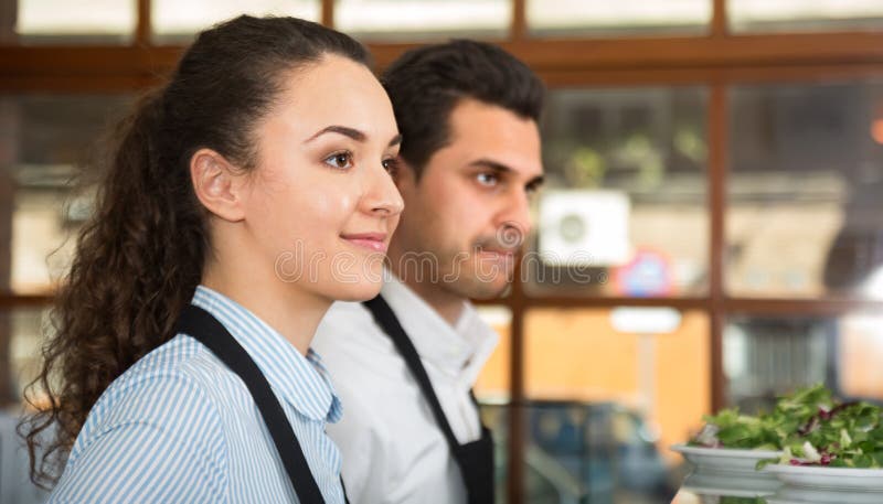 Portrait of Two Attentive Workers with Kebab Stock Image - Image of ...