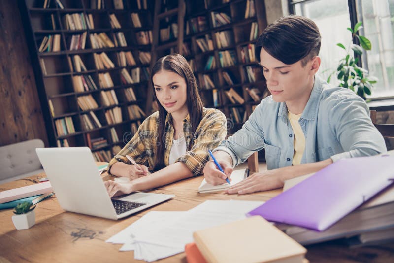 Portrait of Two Attractive Creative Busy Learners Watching Web Course ...
