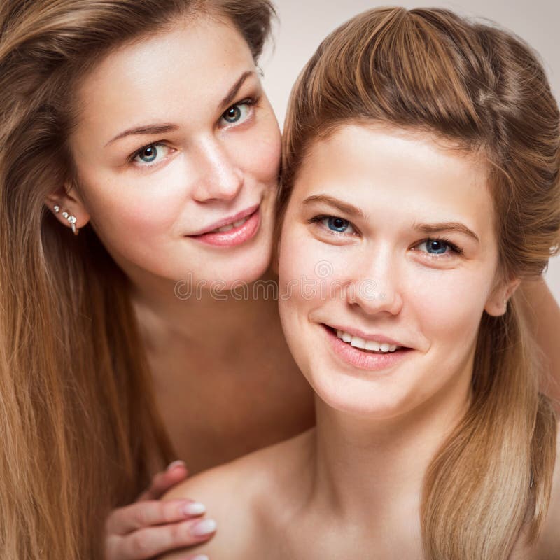Portrait of Two Beautiful Young Smiling Women Stock Photo - Image of ...