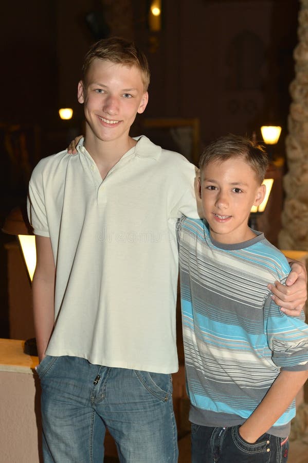 Portrait of two brothers stock photo. Image of junior - 52039186