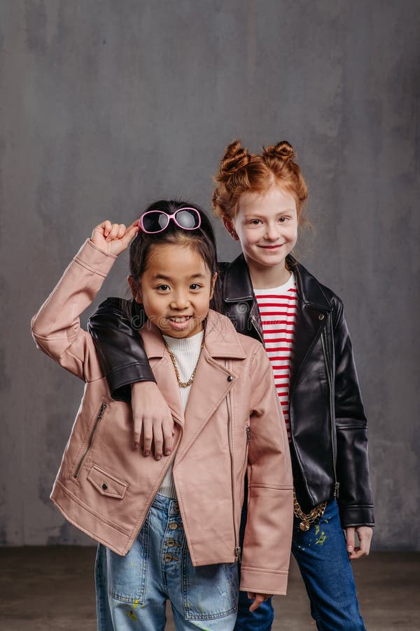 Portrait of Two Children with Leather Jacket. Stock Image - Image of ...