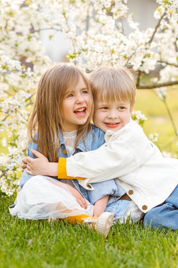 Portrait of Two Children in the Spring Stock Photo - Image of family ...