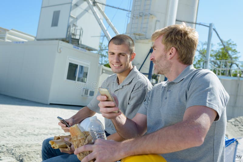 Portrait Two Construction Workers Taking Break Outdoors Stock Image ...