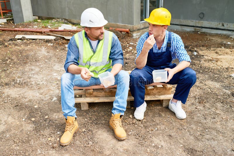 Construction Workers on Lunch Break Stock Image - Image of building ...