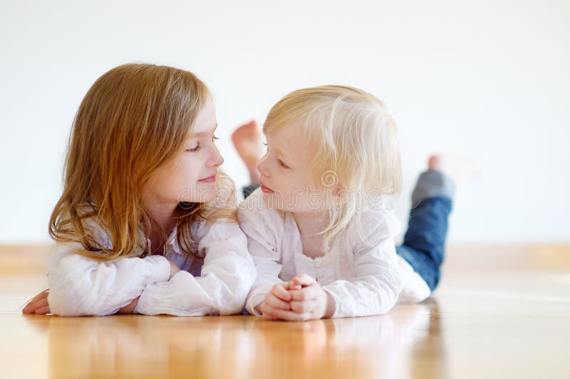 Portrait of Two Cute Sisters Stock Image - Image of playful, adorable ...