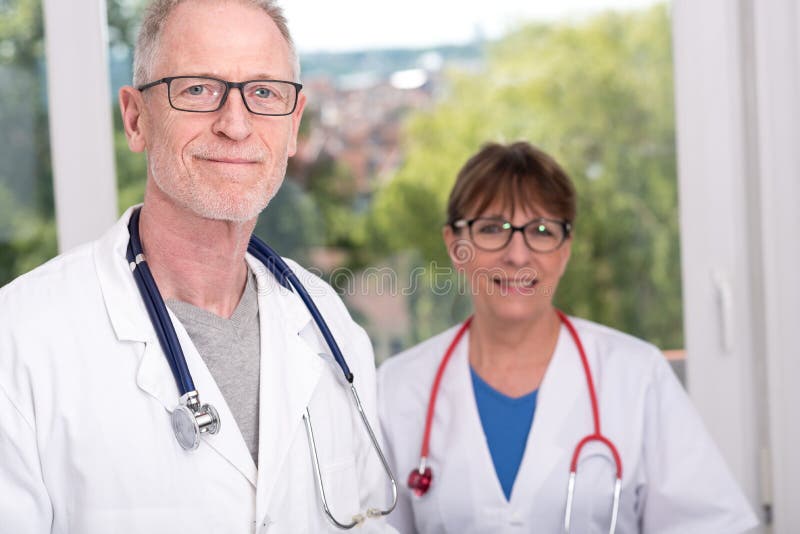 Portrait of two doctors stock photo. Image of healthcare - 94502054