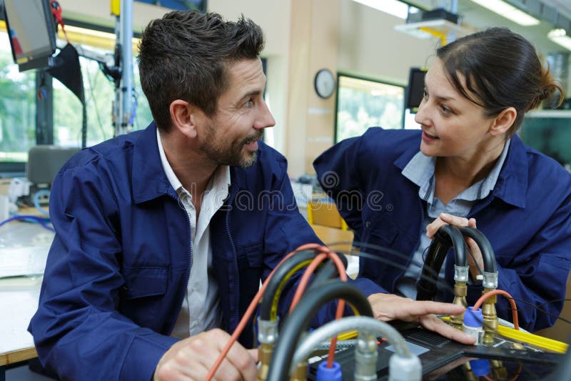 Portrait Two Engineers Working with Cables Stock Photo - Image of ...