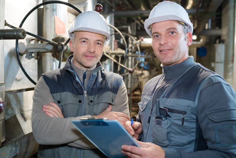 Portrait Two Factory Workers with Documents in Hand Stock Photo - Image ...