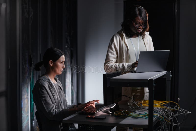 Two Female it Engineers in Server Room Stock Photo - Image of ...