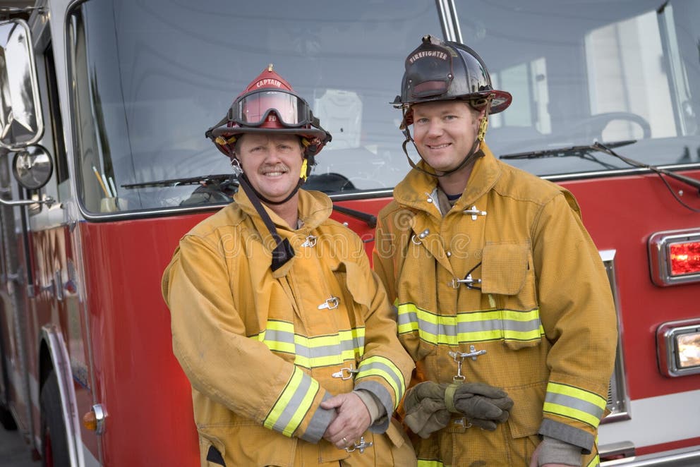 Portrait of Two Firefighters by a Fire Engine Stock Photo - Image of ...