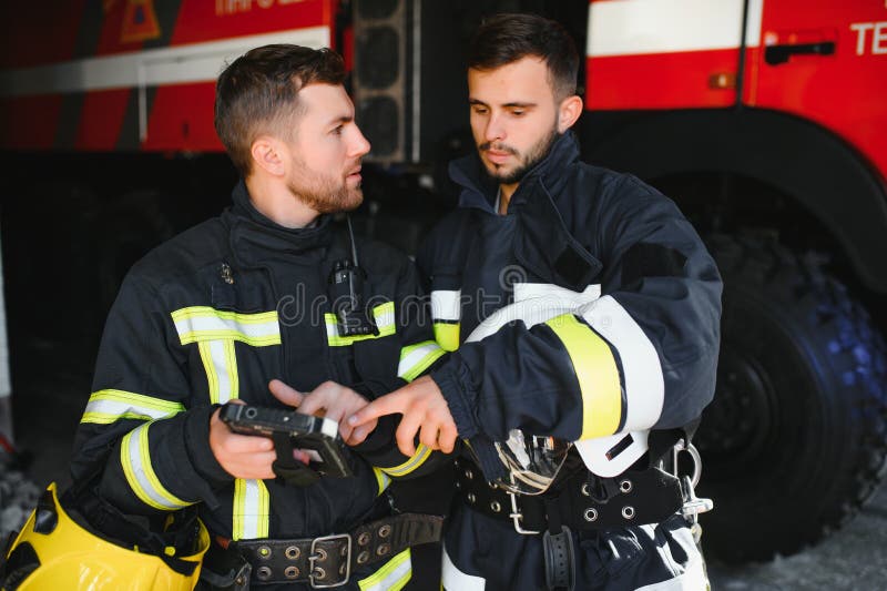 Portrait of Two Firefighters in Fire Fighting Operation, Fireman in ...