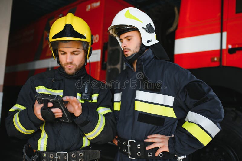 Portrait of Two Firefighters in Fire Fighting Operation, Fireman in ...