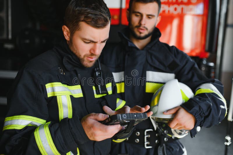 Portrait of Two Firefighters in Fire Fighting Operation, Fireman in ...