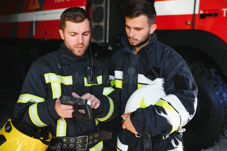 Portrait of Two Firefighters in Fire Fighting Operation, Fireman in ...