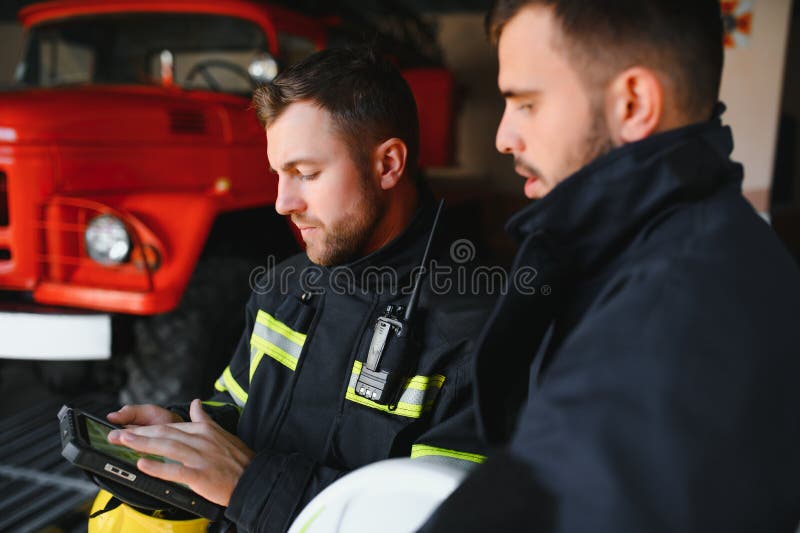 Portrait of Two Firefighters in Fire Fighting Operation, Fireman in ...