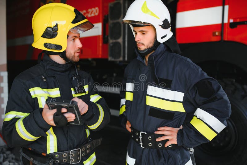Portrait of Two Firefighters in Fire Fighting Operation, Fireman in ...