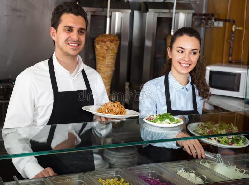 Portrait of Two Friendly Workers with Kebab Stock Image - Image of ...